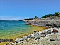 Little Known Limestone Caves and Cliffs Hidden along Lake Manitoba’s ...